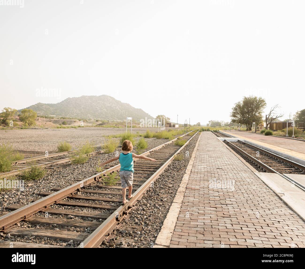Boy on railroad track hi-res stock photography and images - Alamy