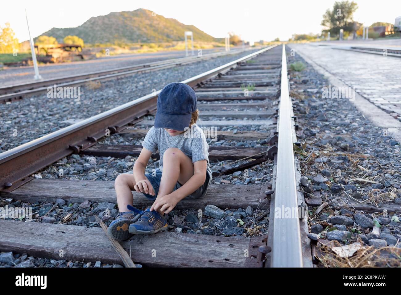 Boy playing on railroad hi-res stock photography and images - Alamy