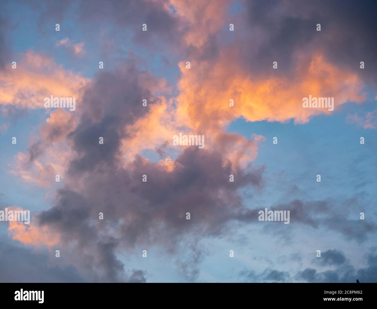 clouds at sunset background texture Stock Photo - Alamy