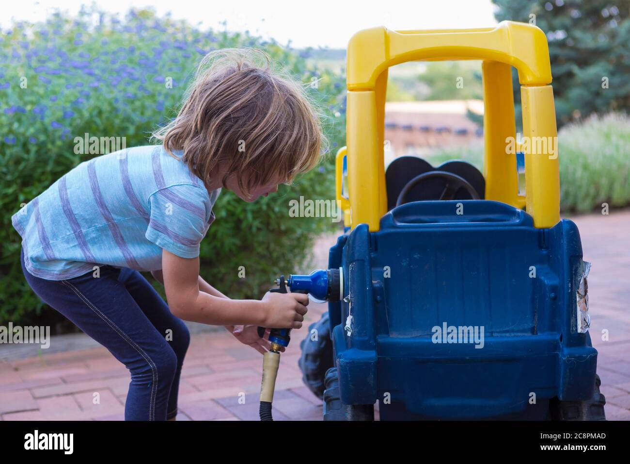 Boy (6 7) playing with toy car hi-res stock photography and images - Alamy