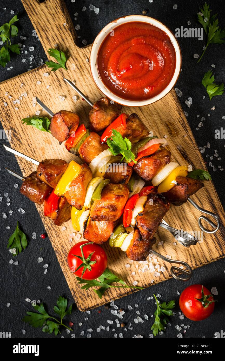 Shish kebab at skewers with vegetable Stock Photo - Alamy