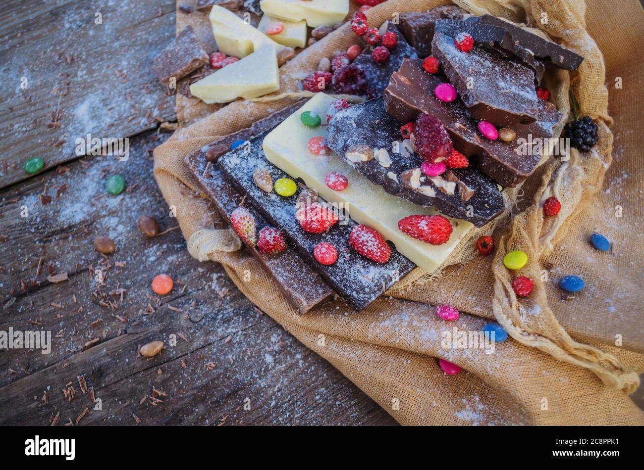 Chocolate blocks stack with different kind of chocolate Stock Photo - Alamy