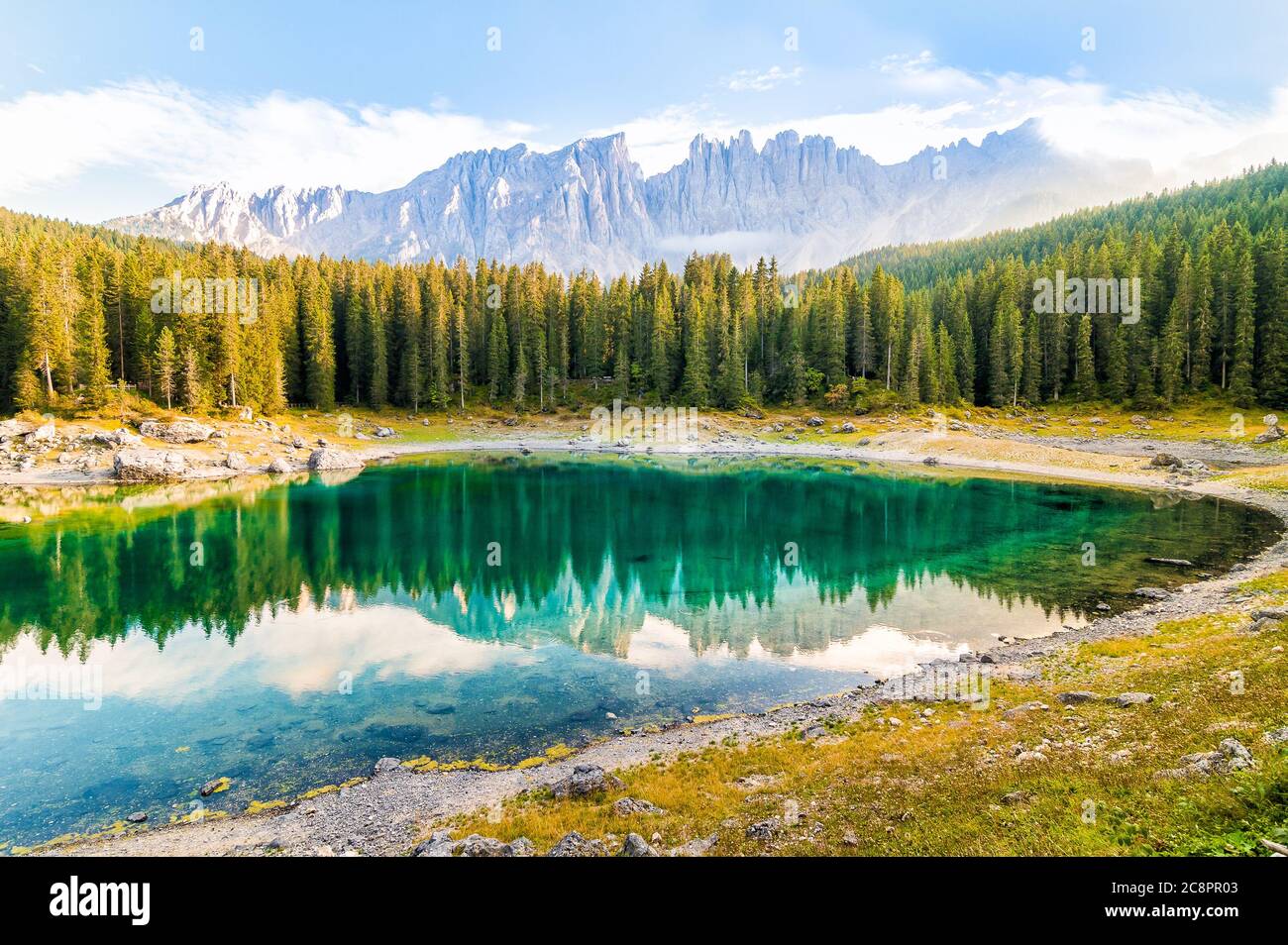 View of a small alpine Lake Carezza o Karersee located in the ...