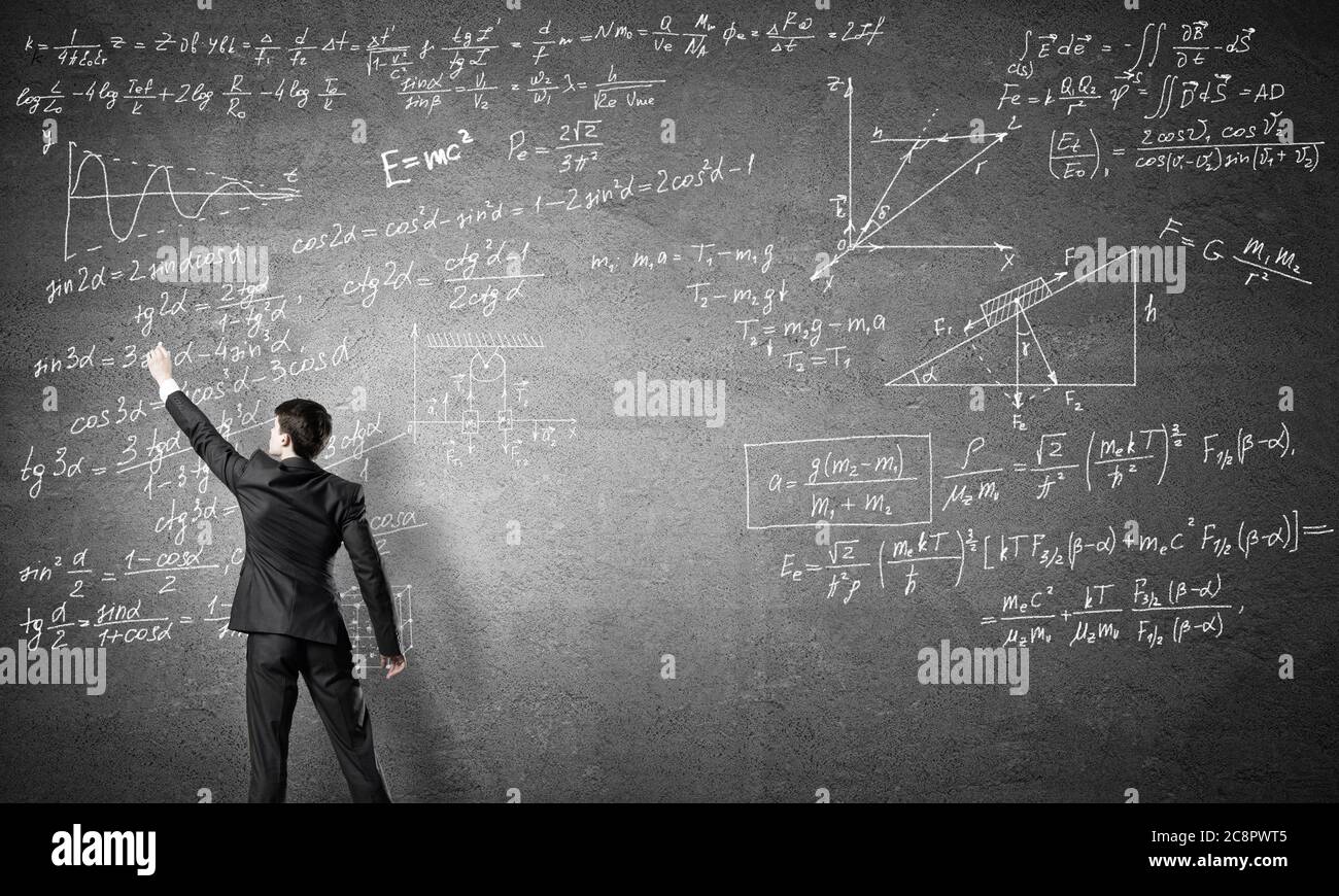 Teacher at the blackboard Stock Photo - Alamy