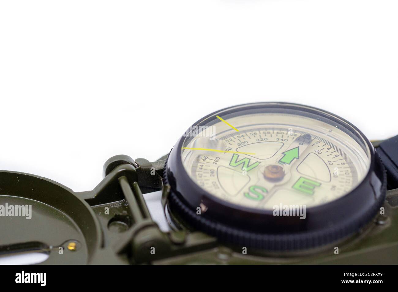 Closeup green color military compass on isolated white background Stock ...