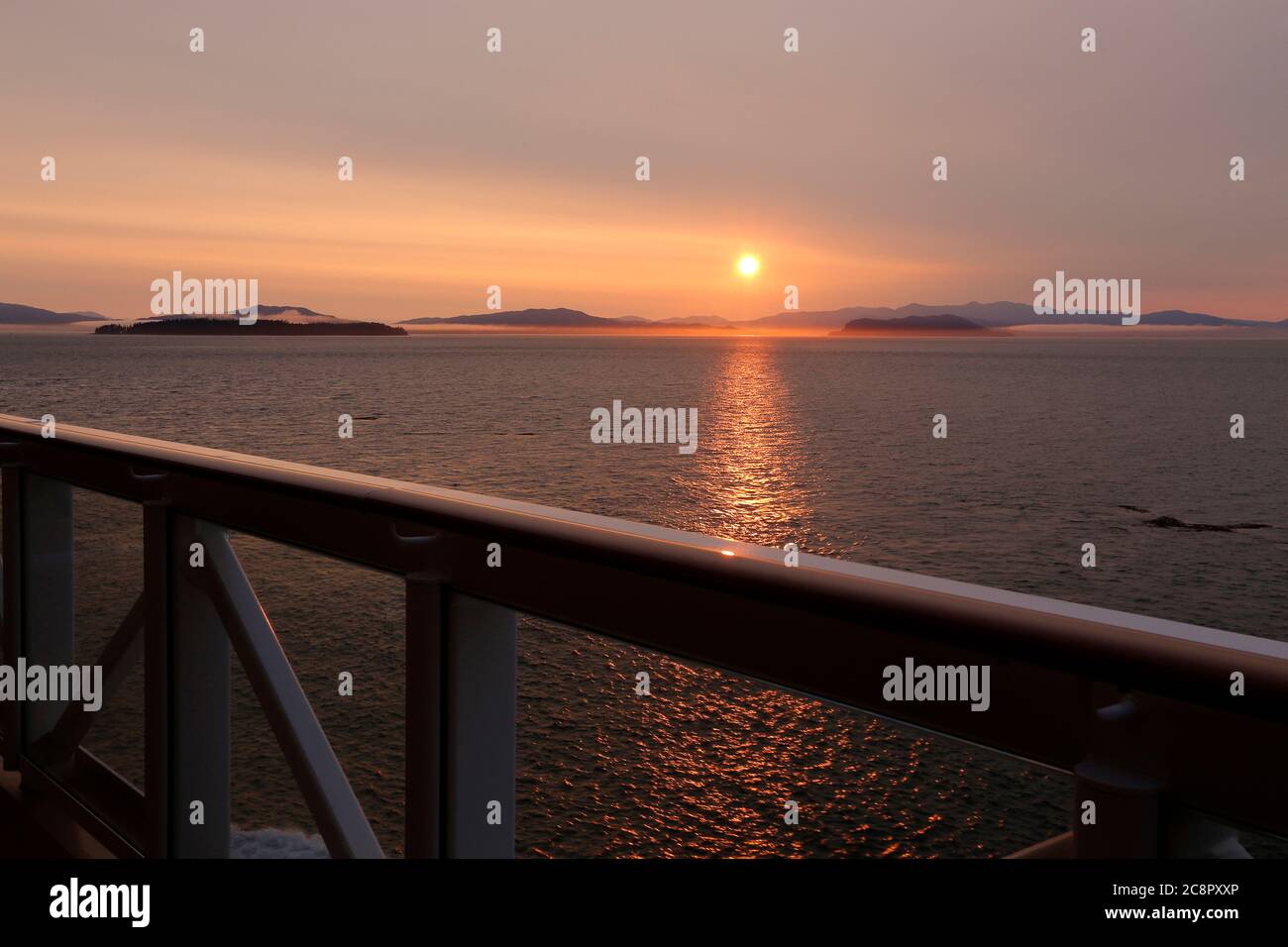sunset over Alaska fjords on a cruise trip near Ketchikan, USA Stock ...