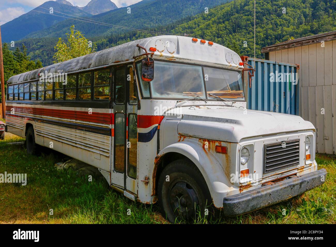 Old white school bus abandoned in Skagway, Alaska, USA Stock Photo - Alamy