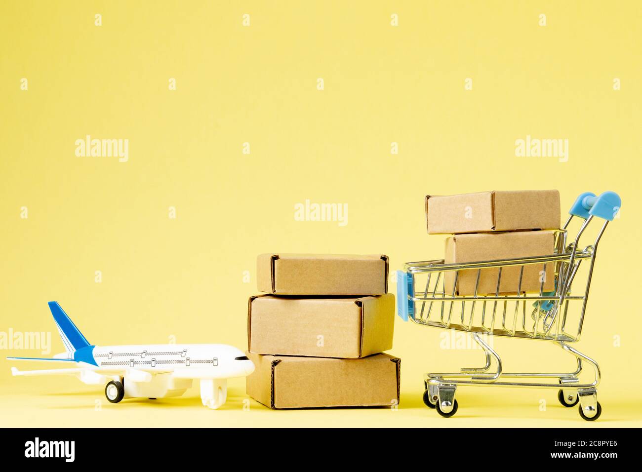 Airplane and stack of cardboard boxes. concept of air cargo and parcels ...