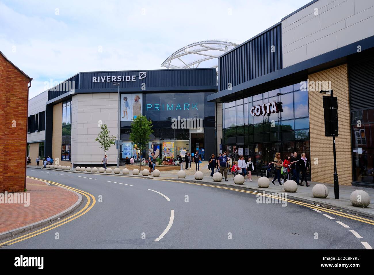 Riverside, Primark, Costa shops and crowd of customers wearing masks ...