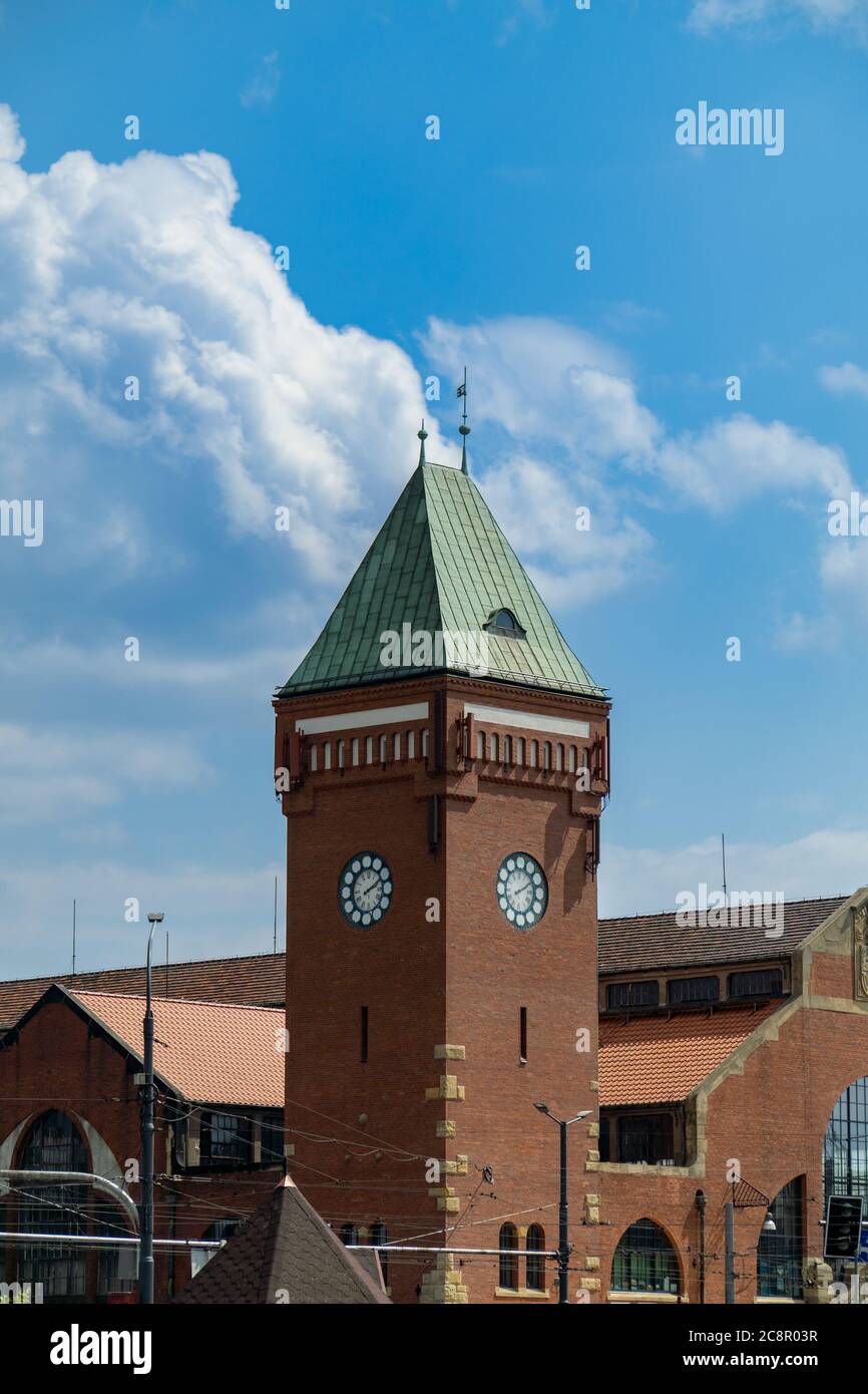 A photo of an old building in Wroclaw, a large, tall clock tower made ...