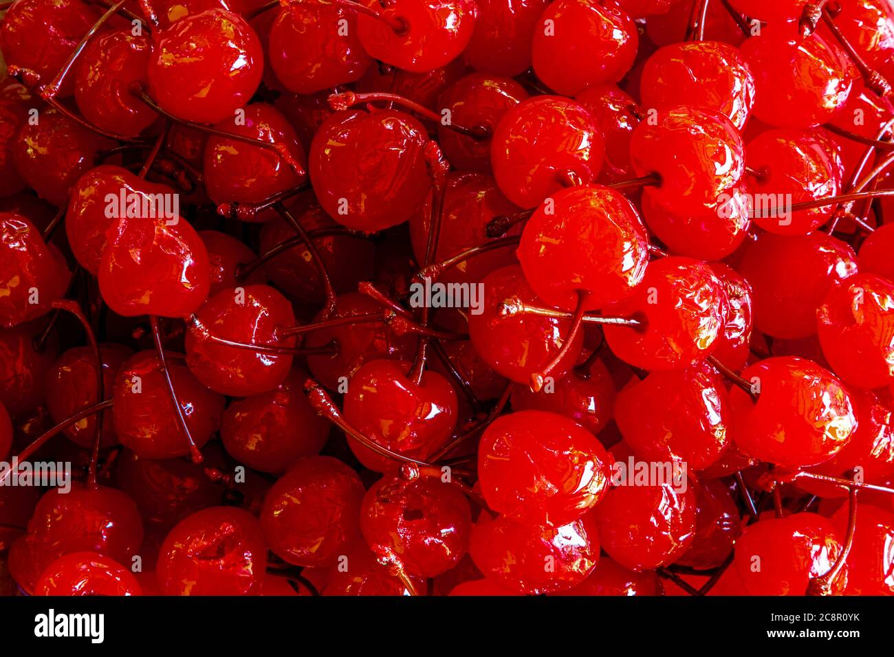 Cherry in syrup texture background Stock Photo - Alamy