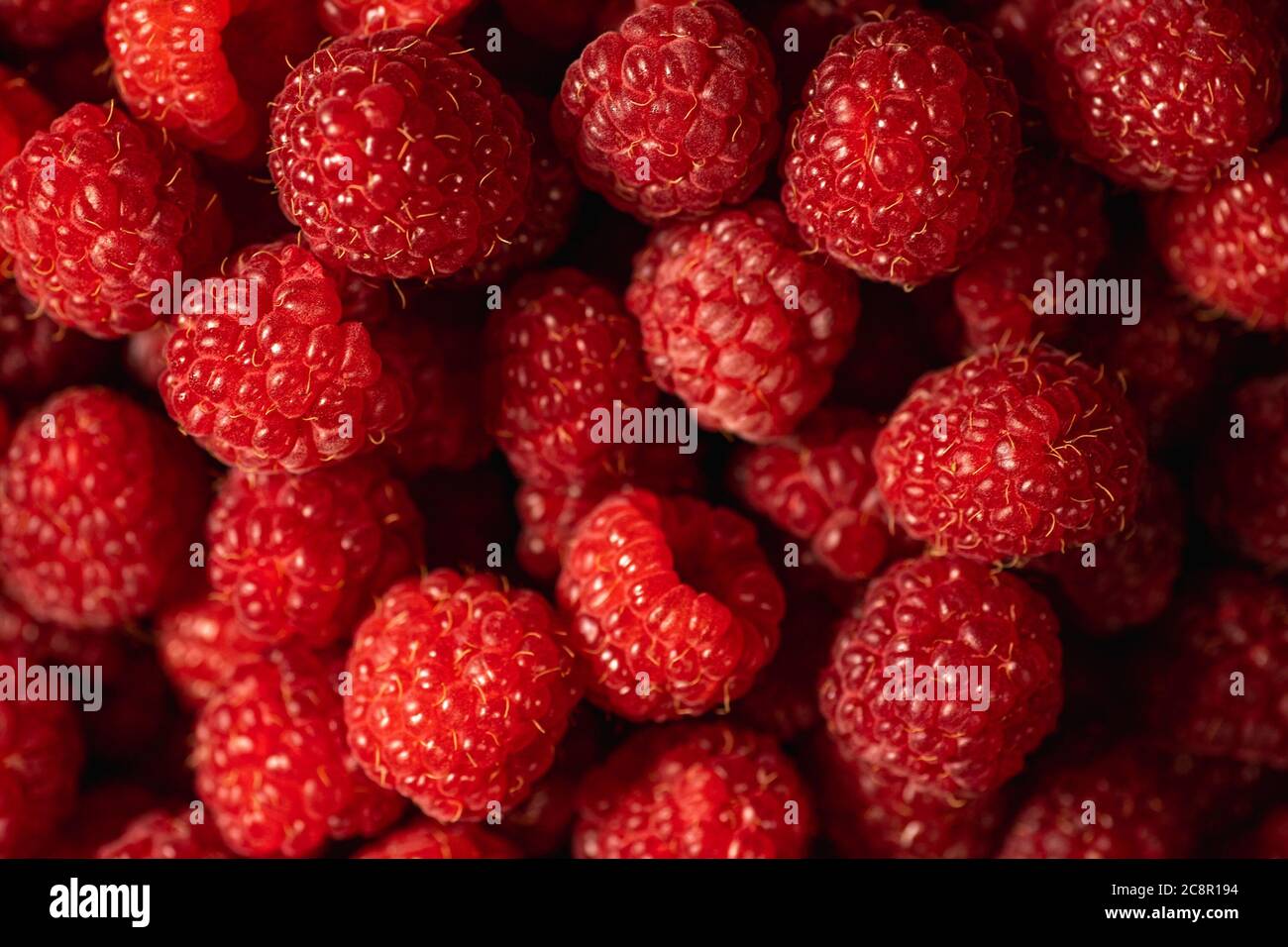 Raspberries background hi-res stock photography and images - Alamy