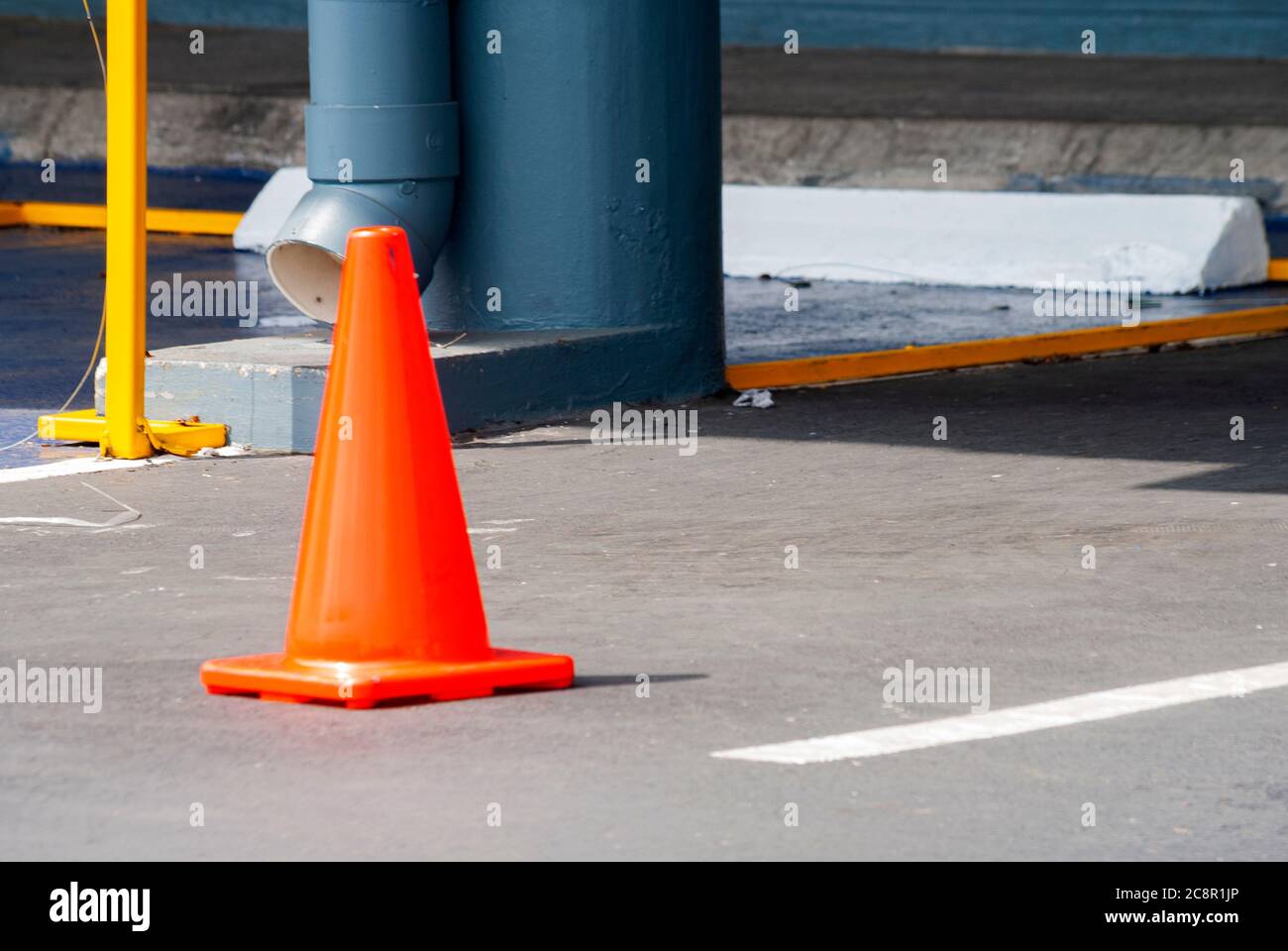 Cone signage in parking area in shopping center, reserved and empty ...