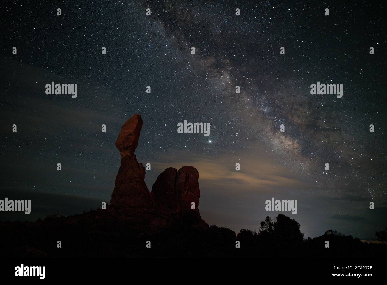 Saturn, Jupiter and the Milky Way over Balanced Rock in Arches National ...