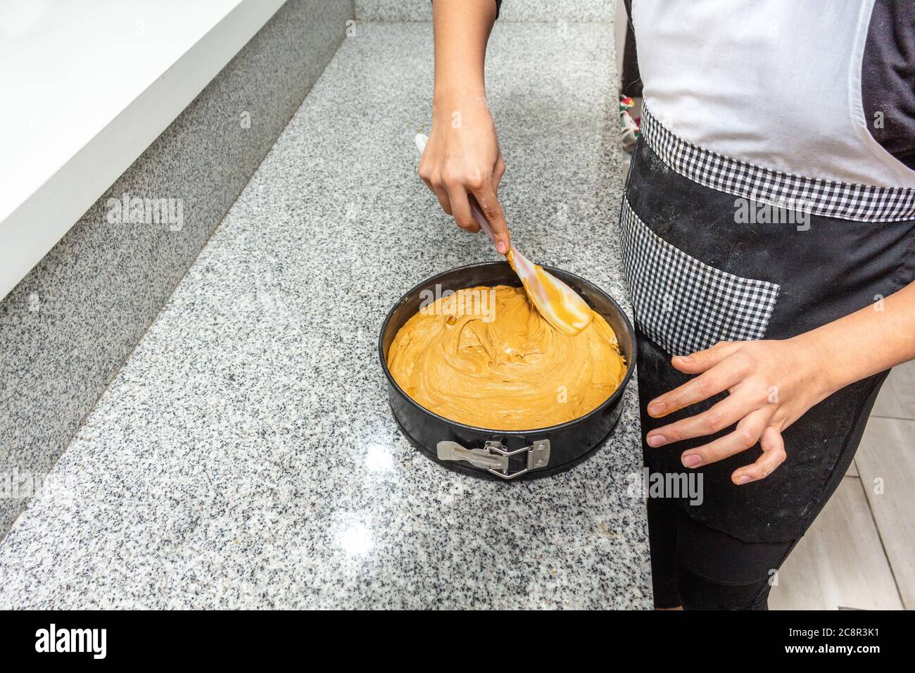 Pouring cake mix pan making hi-res stock photography and images - Alamy