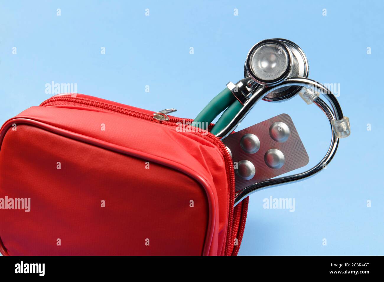 first aid kit with stethoscope and medicine blister Stock Photo - Alamy