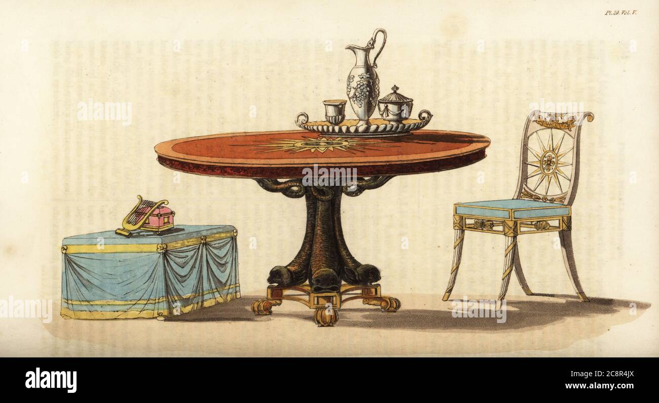 Fashionable furniture in the French style. Round table with metal ...