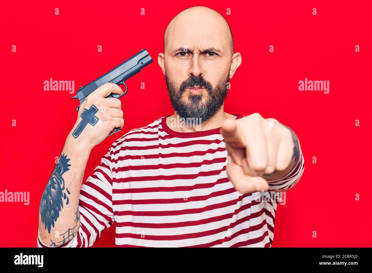 Person holding gun violence sign hi-res stock photography and images ...