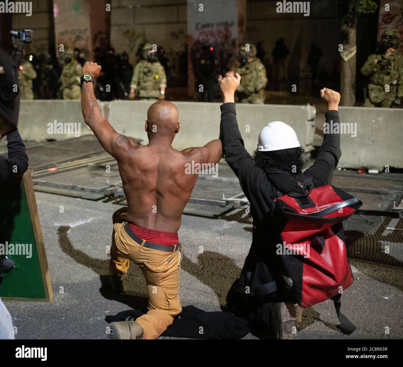 Protesters tear gassed hi-res stock photography and images - Alamy