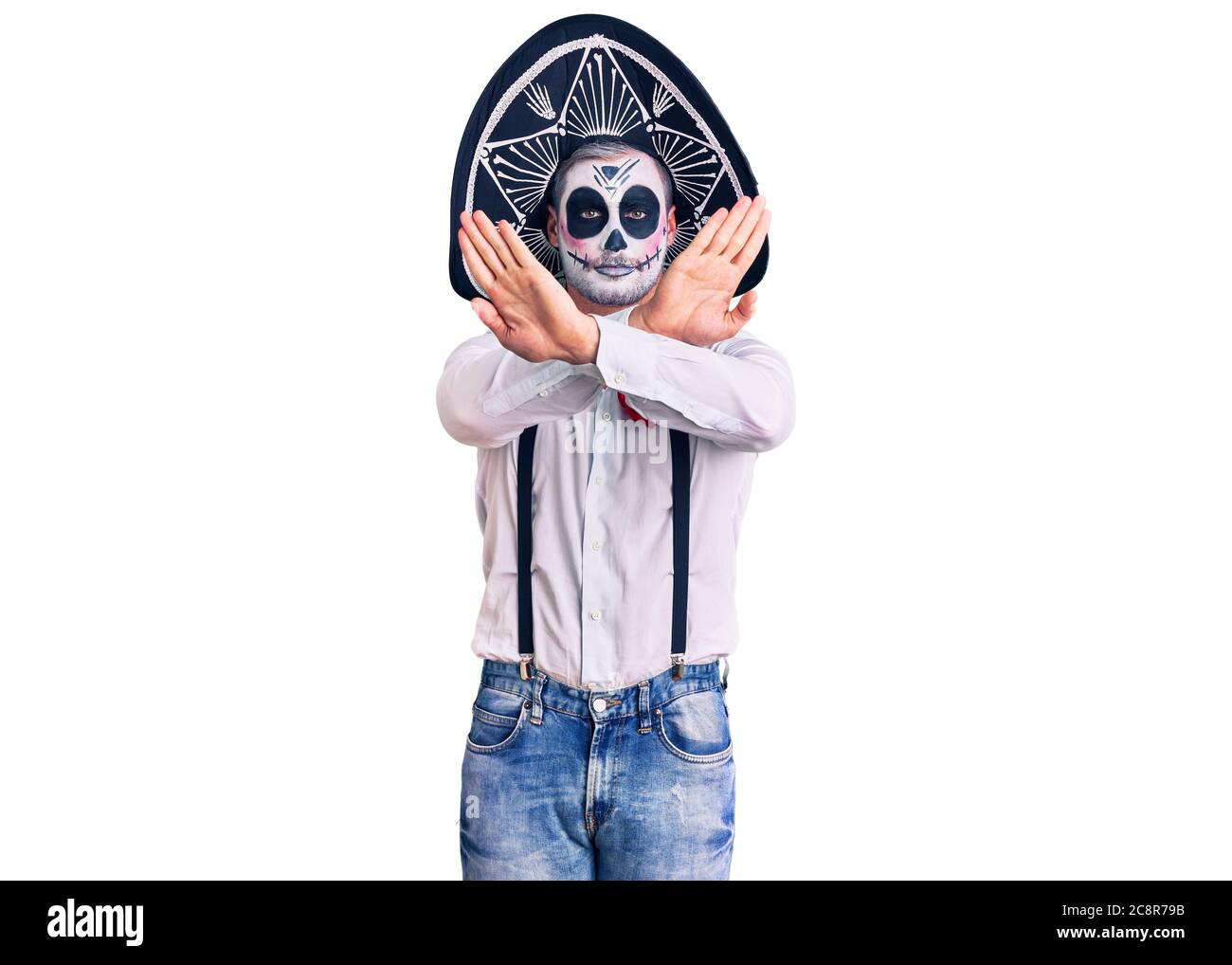 Man wearing day of the dead costume over background rejection ...