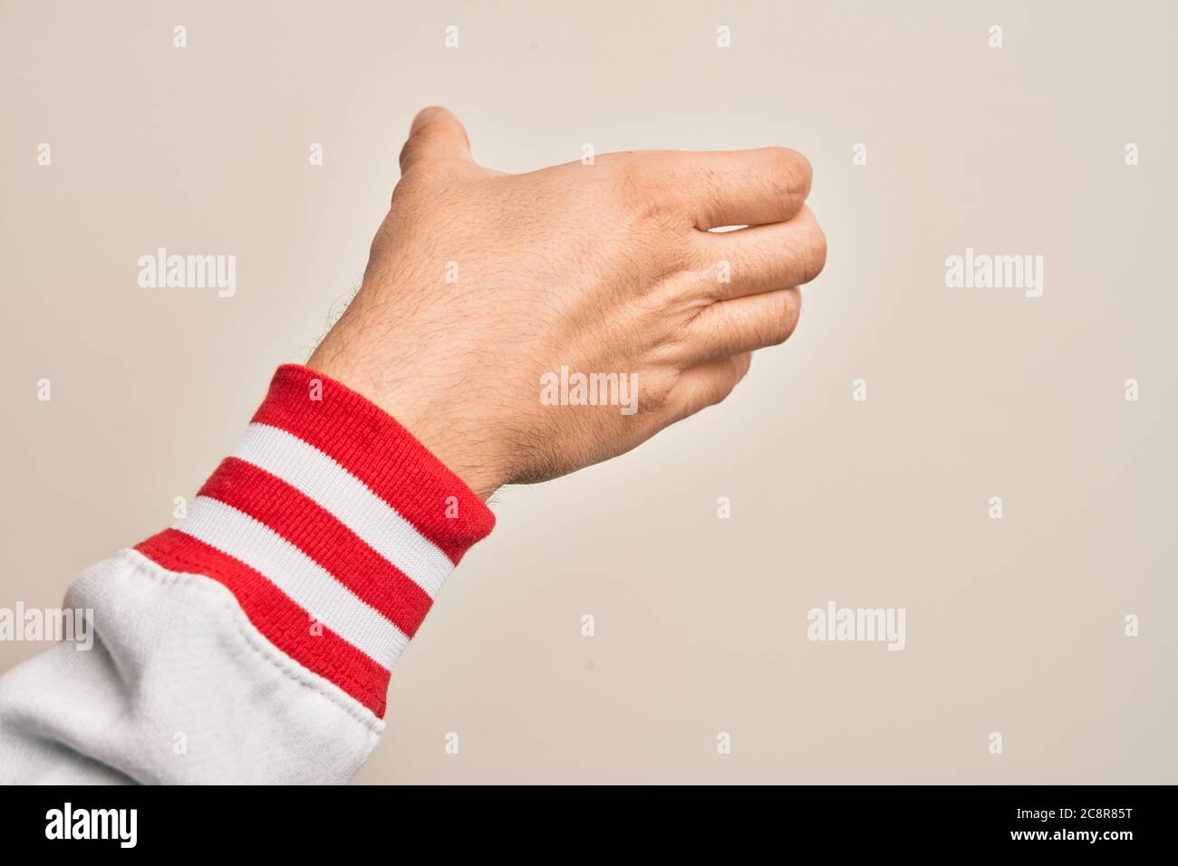 Hand of caucasian young man showing fingers over isolated white ...