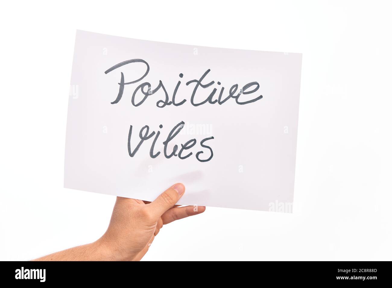 Cardboard banner with POSITIVE VIBES text over isolated white ...