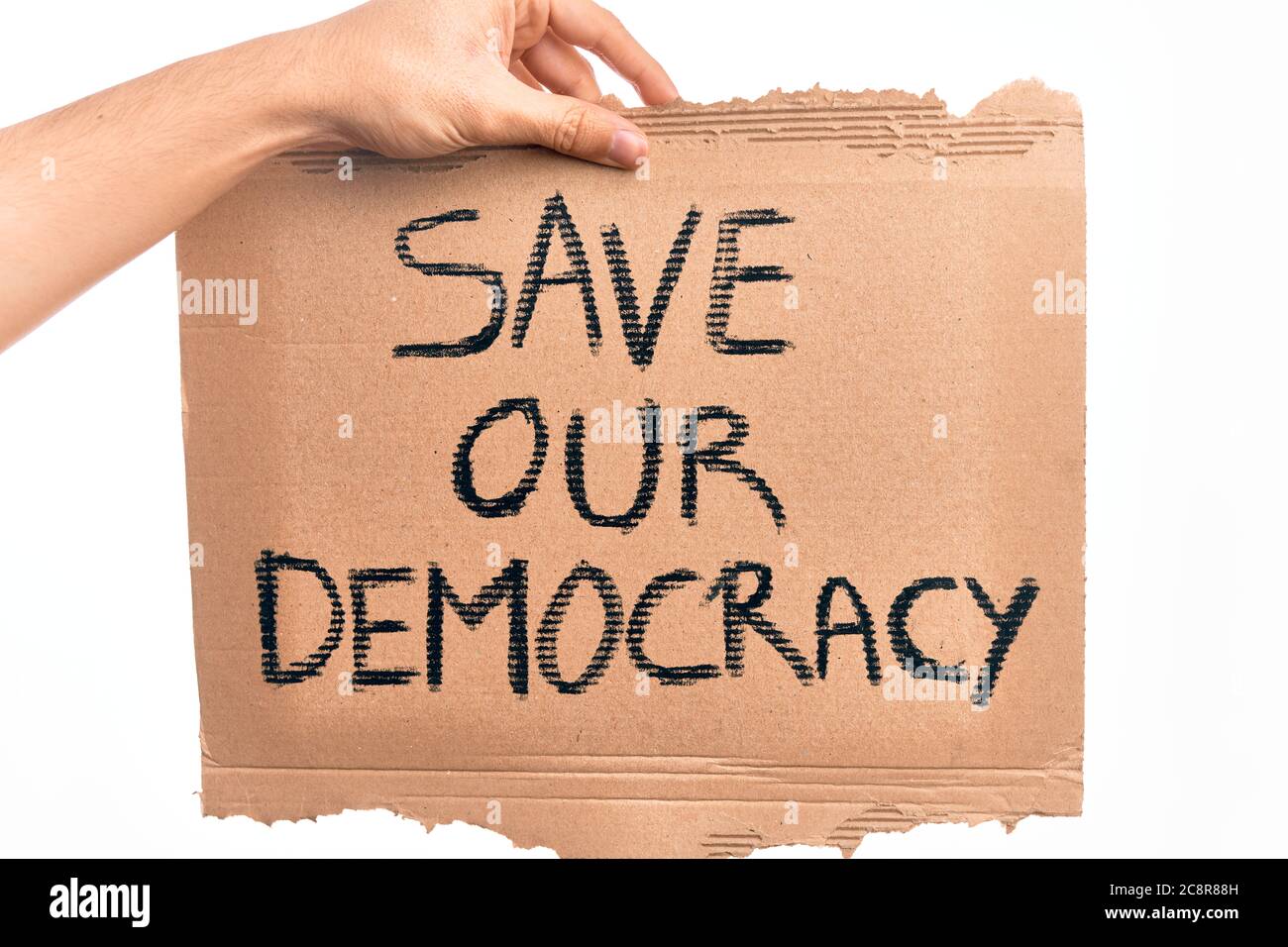 Cardboard banner with SAVE OUT DEMOCRACY text asking for political ...