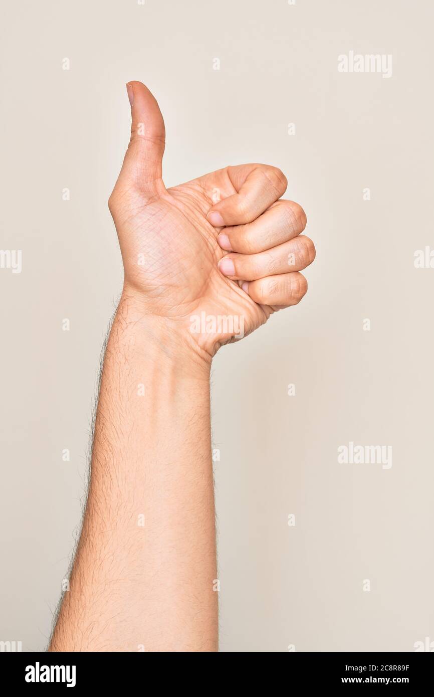 Hand of caucasian young man showing fingers over isolated white ...