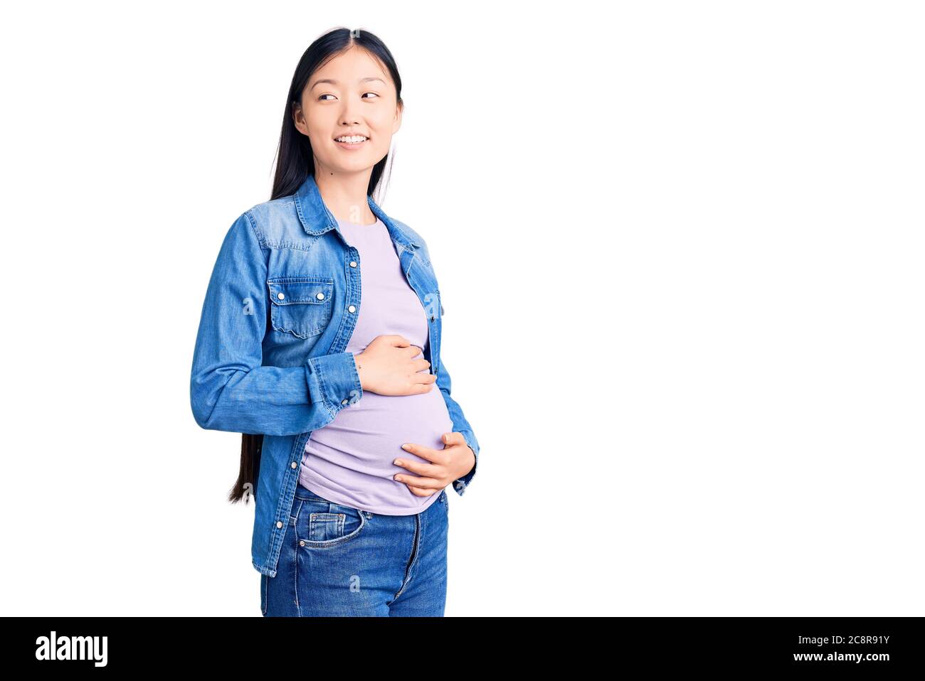 Mother baby smiling looking profile Cut Out Stock Images & Pictures - Alamy