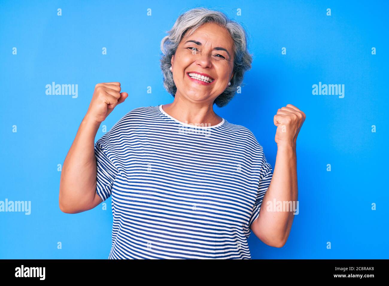 Senior hispanic grey- haired woman wearing casual clothes very happy ...