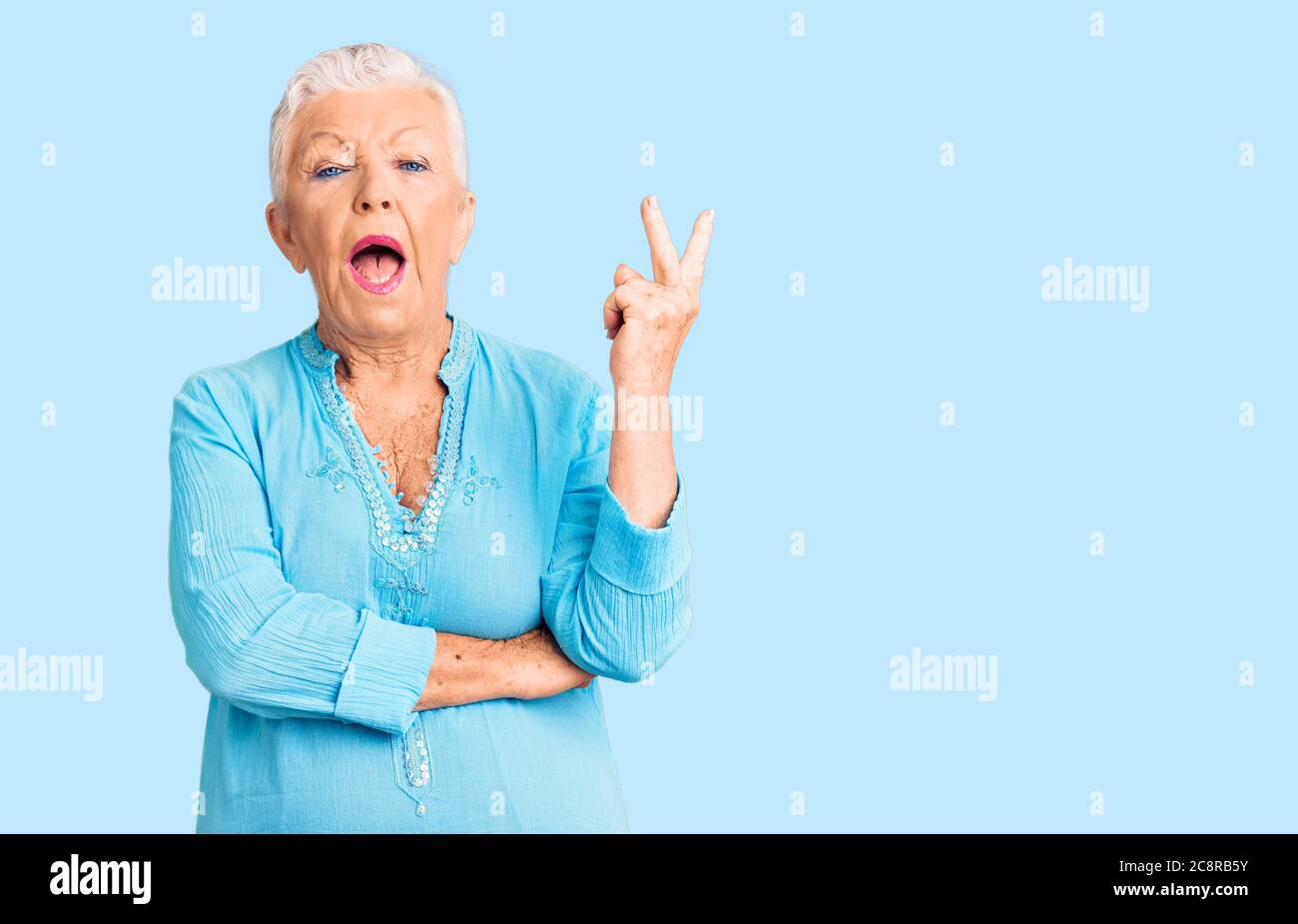 Grey eyes wink woman hi-res stock photography and images - Alamy