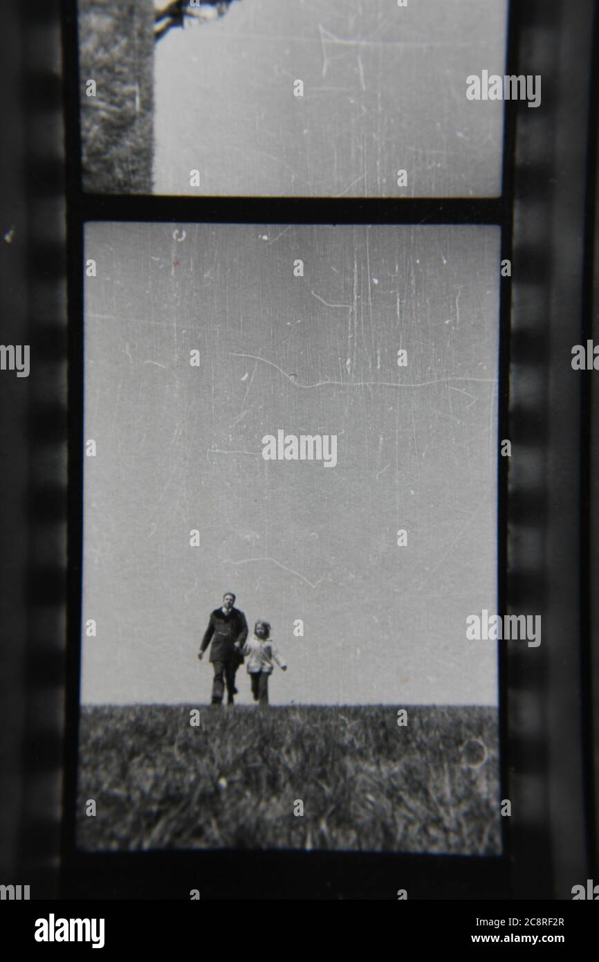 Fine 1970s vintage black and white photography of a father spending ...