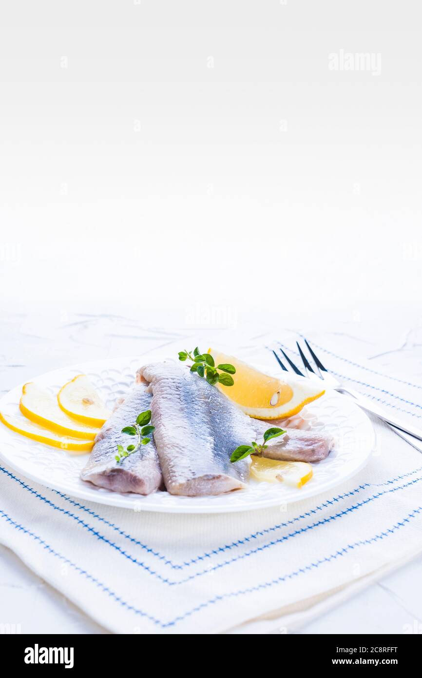 Dutch herring. Traditional Dutch food, marinated fish fillet with onion ...