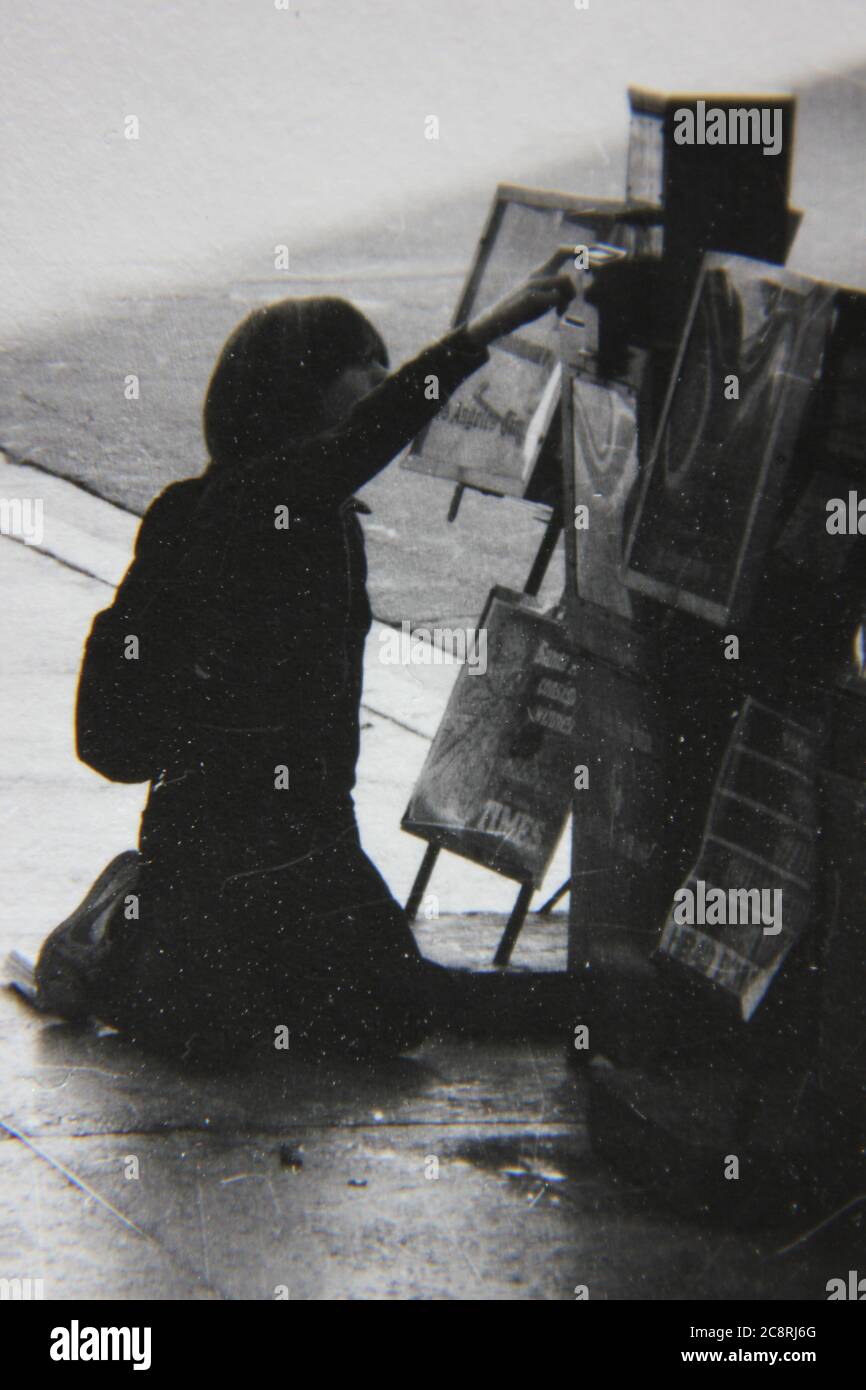 Fine 70s vintage black and white lifestyle photography of a kid buying ...