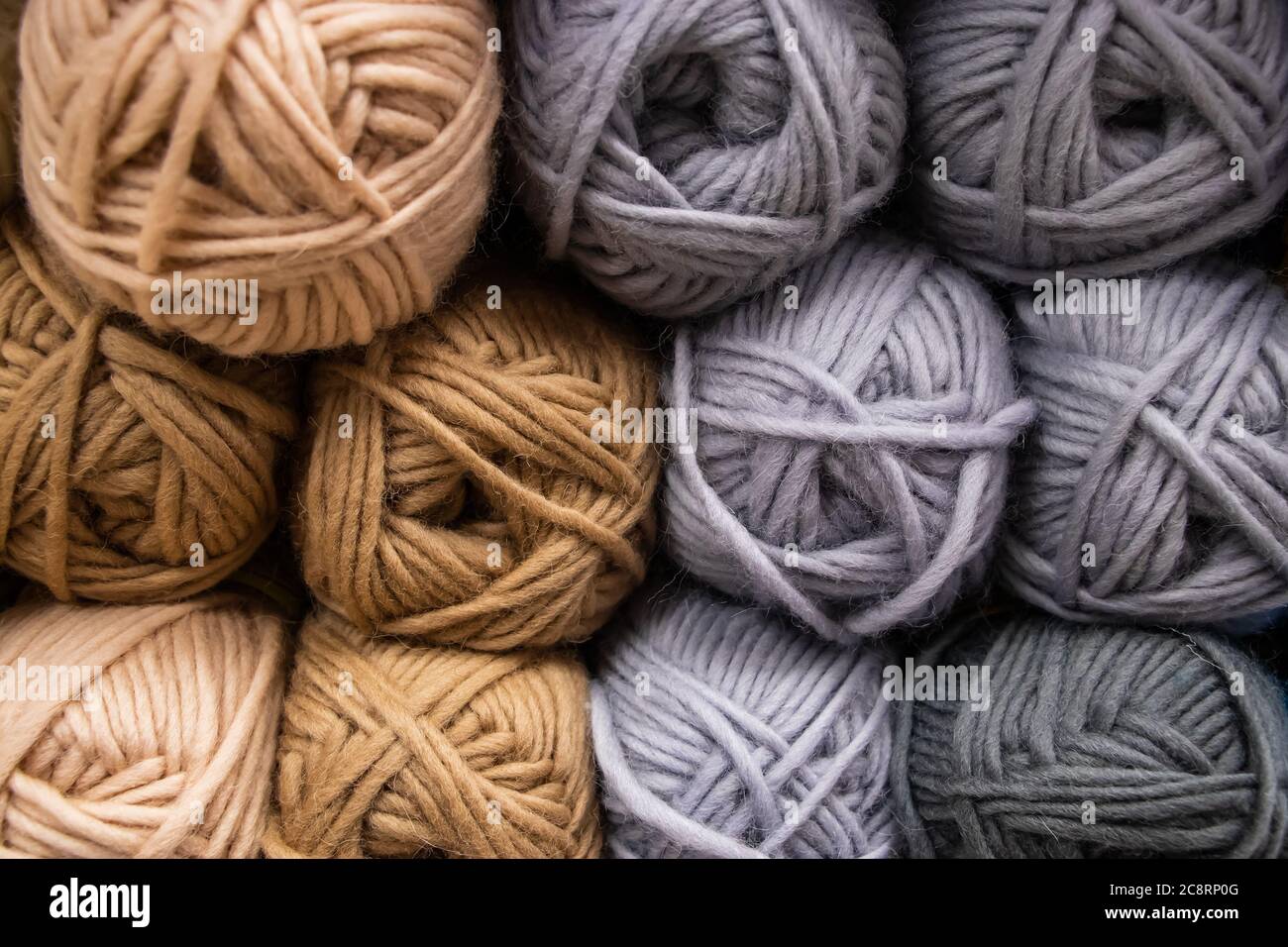 The texture of multi-colored fluffy woolen threads for knitting closeup ...