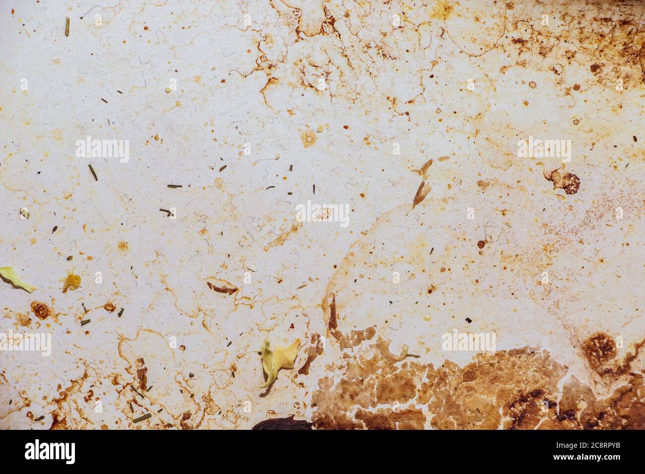 Texture of dirty stains and grease on white stove. Dried stains of fat ...