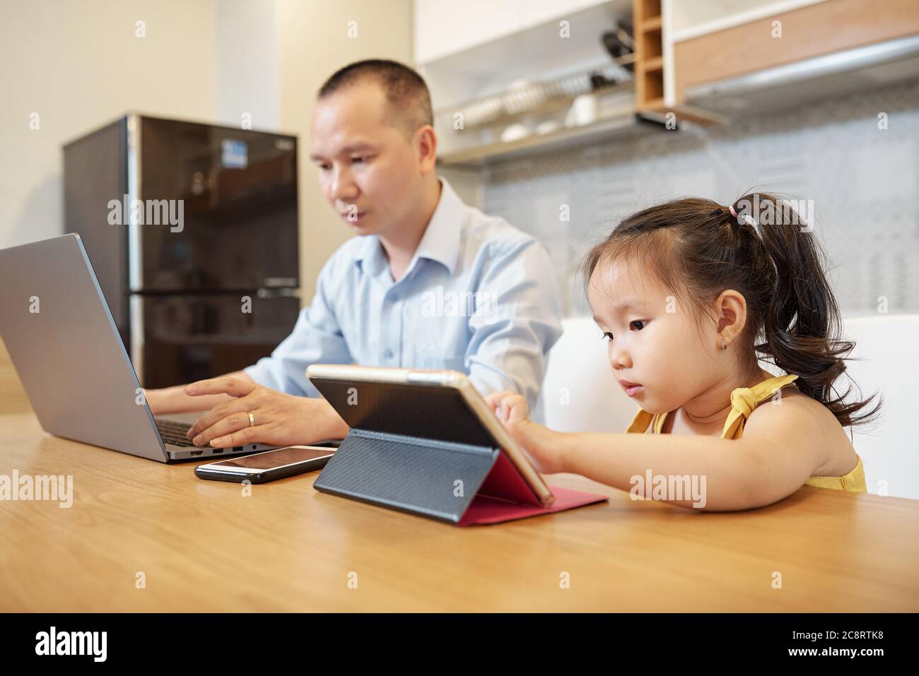 Cute vietnamese girl working on hi-res stock photography and images - Alamy