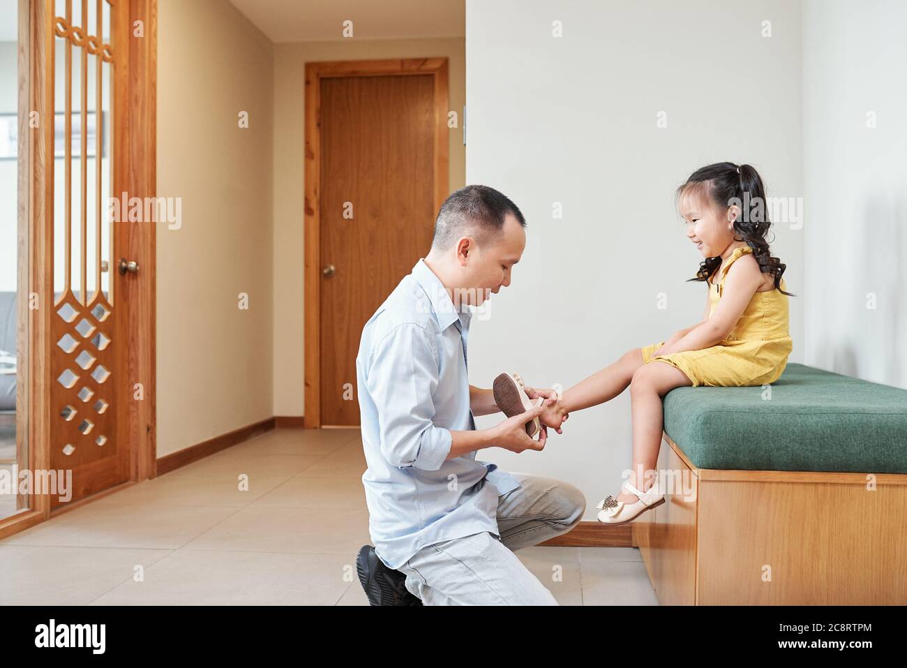 Put on her shoes hi-res stock photography and images - Alamy