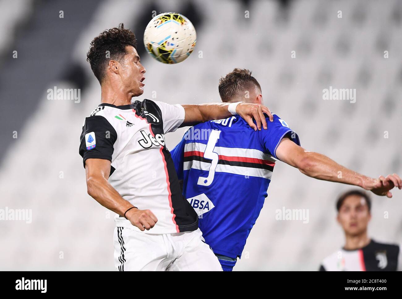 Turin, Italy. 26th July, 2020. Cristiano Ronaldo wins the header from ...