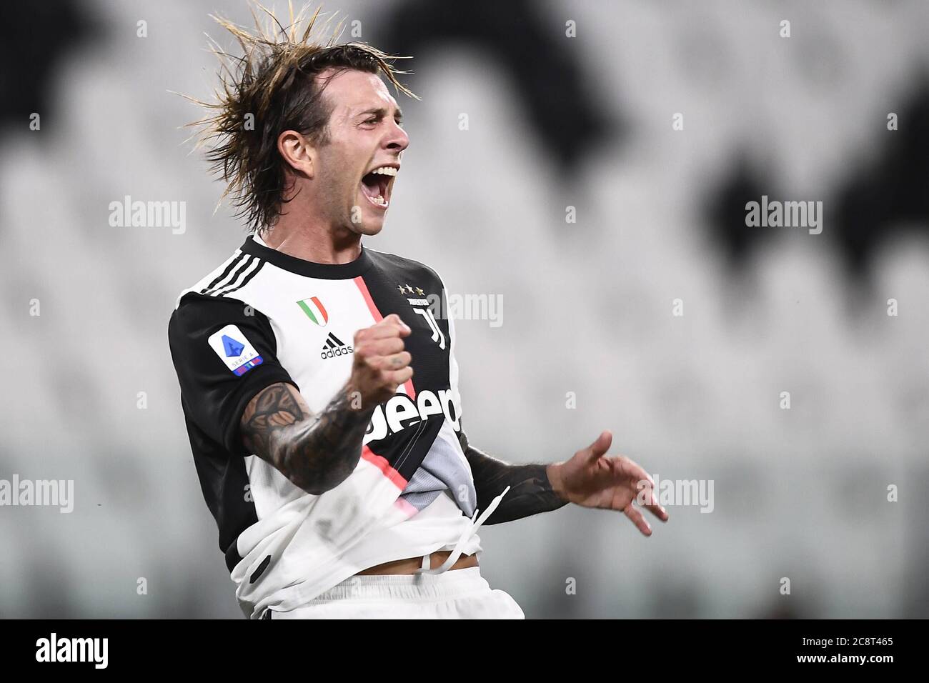 Turin, Italy. 26th July, 2020. Federico Bernardeschi celebrates as he ...