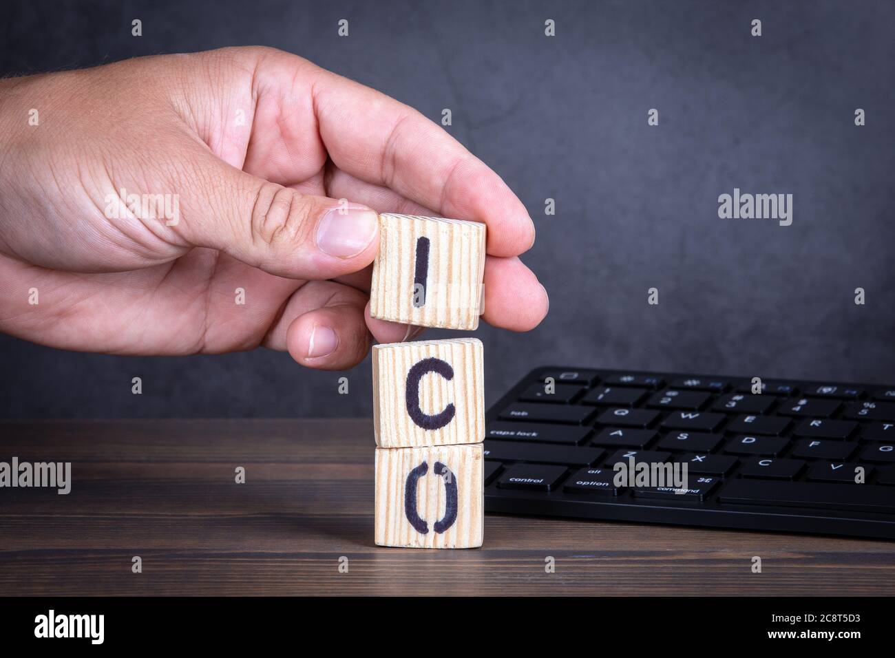 ICO, Initial Coin Offering concept. wooden alphabet letters and ...