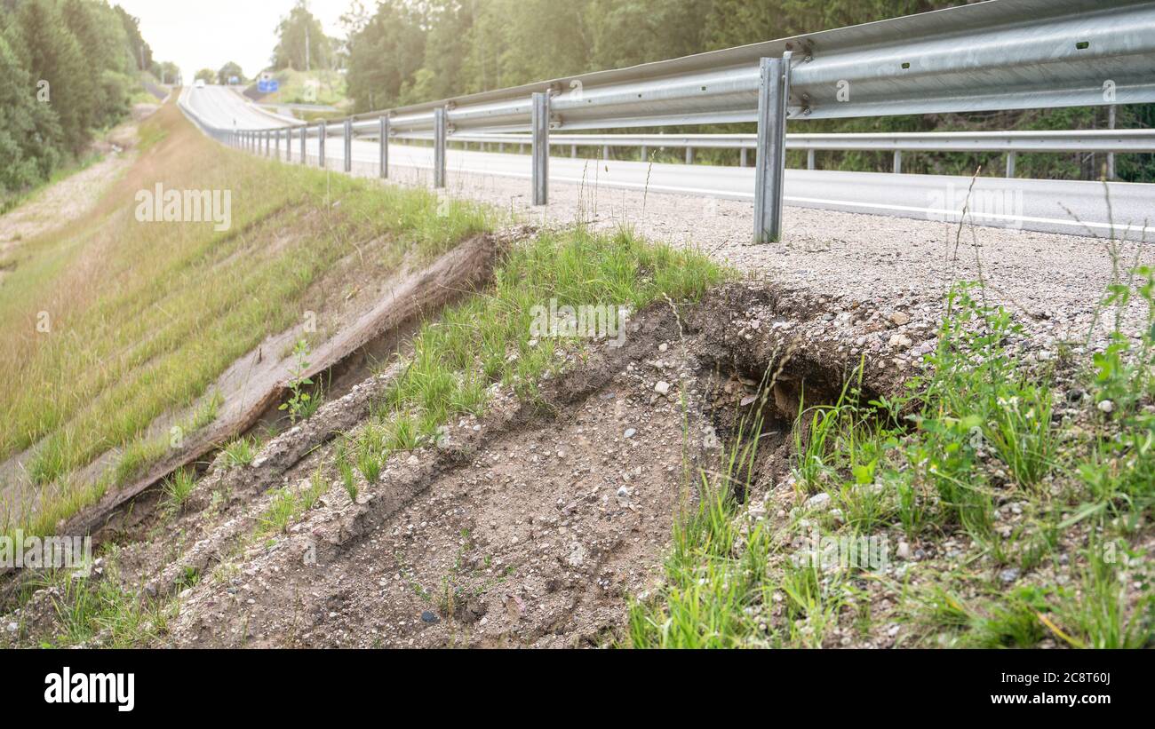 Washed out side of road after heavy rain. Technical solutions for road ...