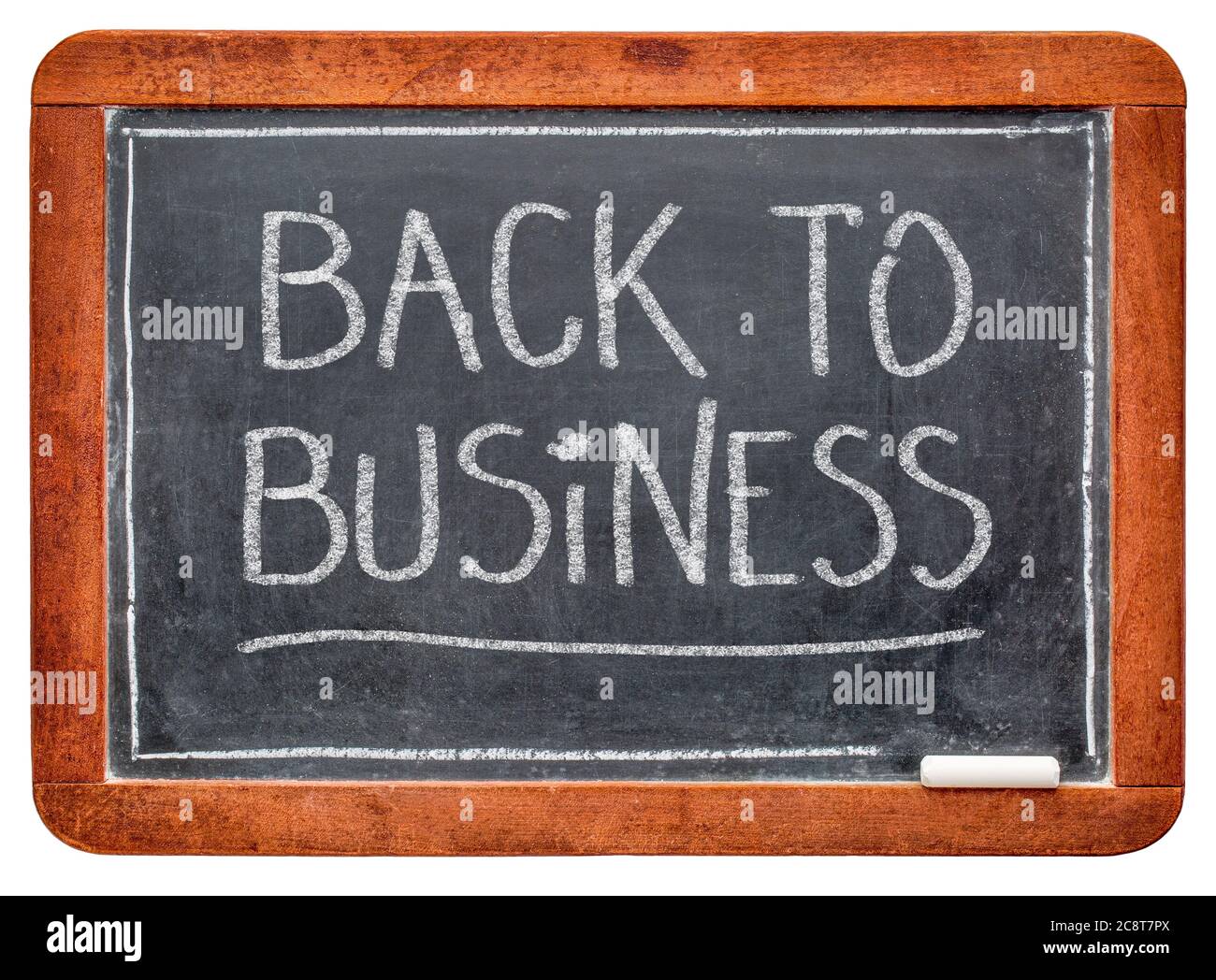 back to business - white chalk handwriting on a slate blackboard ...
