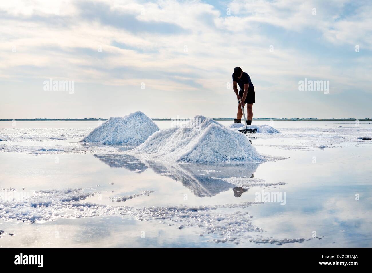 Salt mining on lake burlinskoye. Bursol'. Altai. Russia. Salt piles and ...