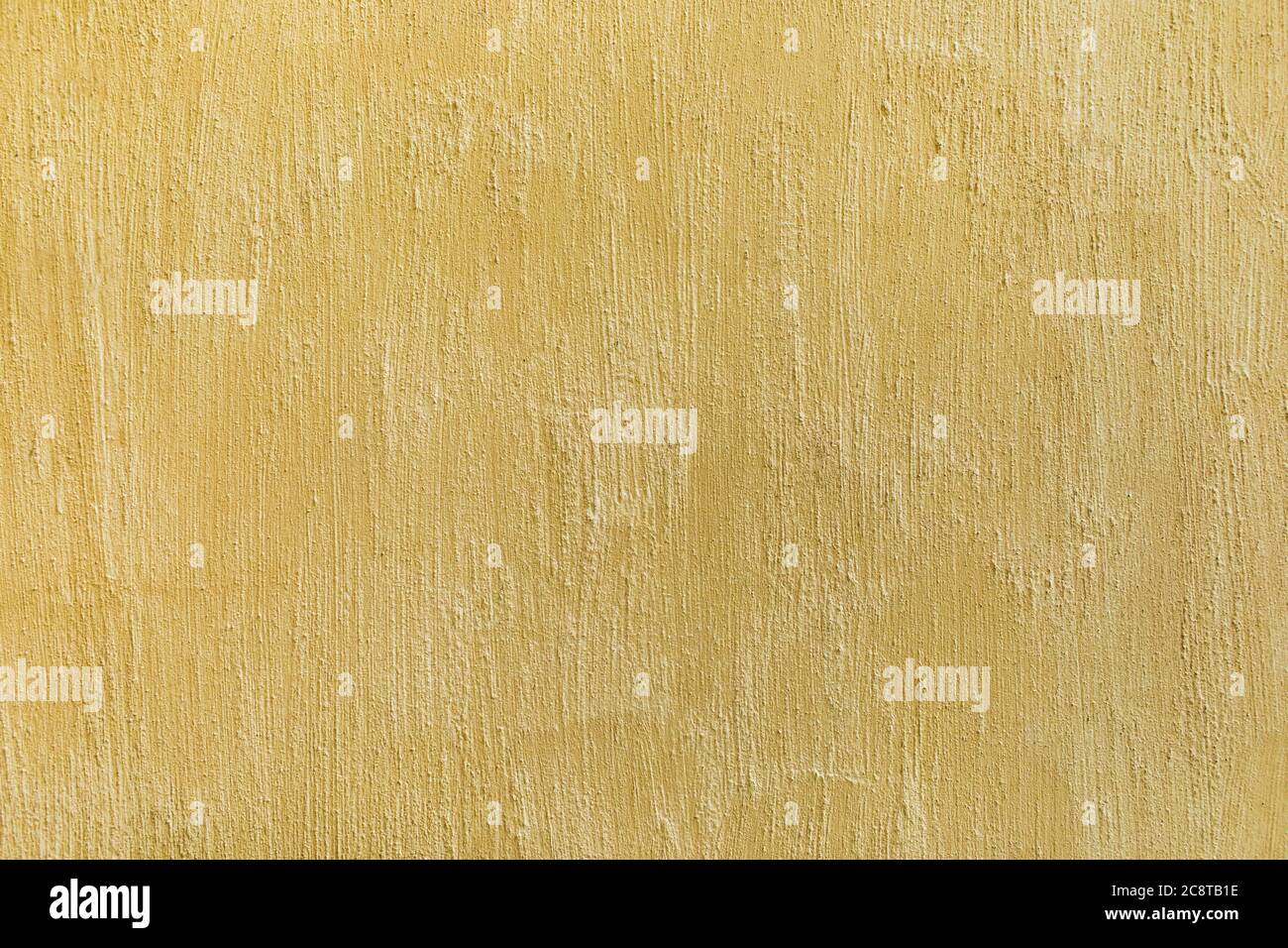 Decorative shabby plaster wall in beige color. Concrete scratched ...