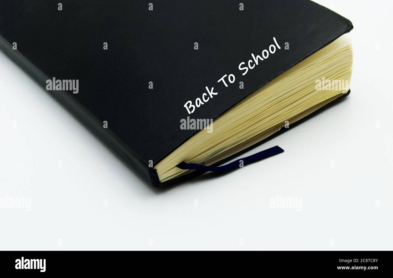 Black notebook isolated on white background. Back to school concept ...