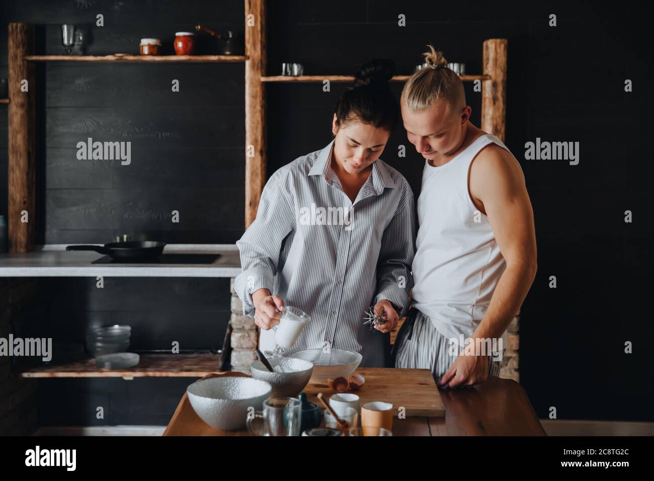 Young couple in love cook healthy food in the kitchen together Stock ...