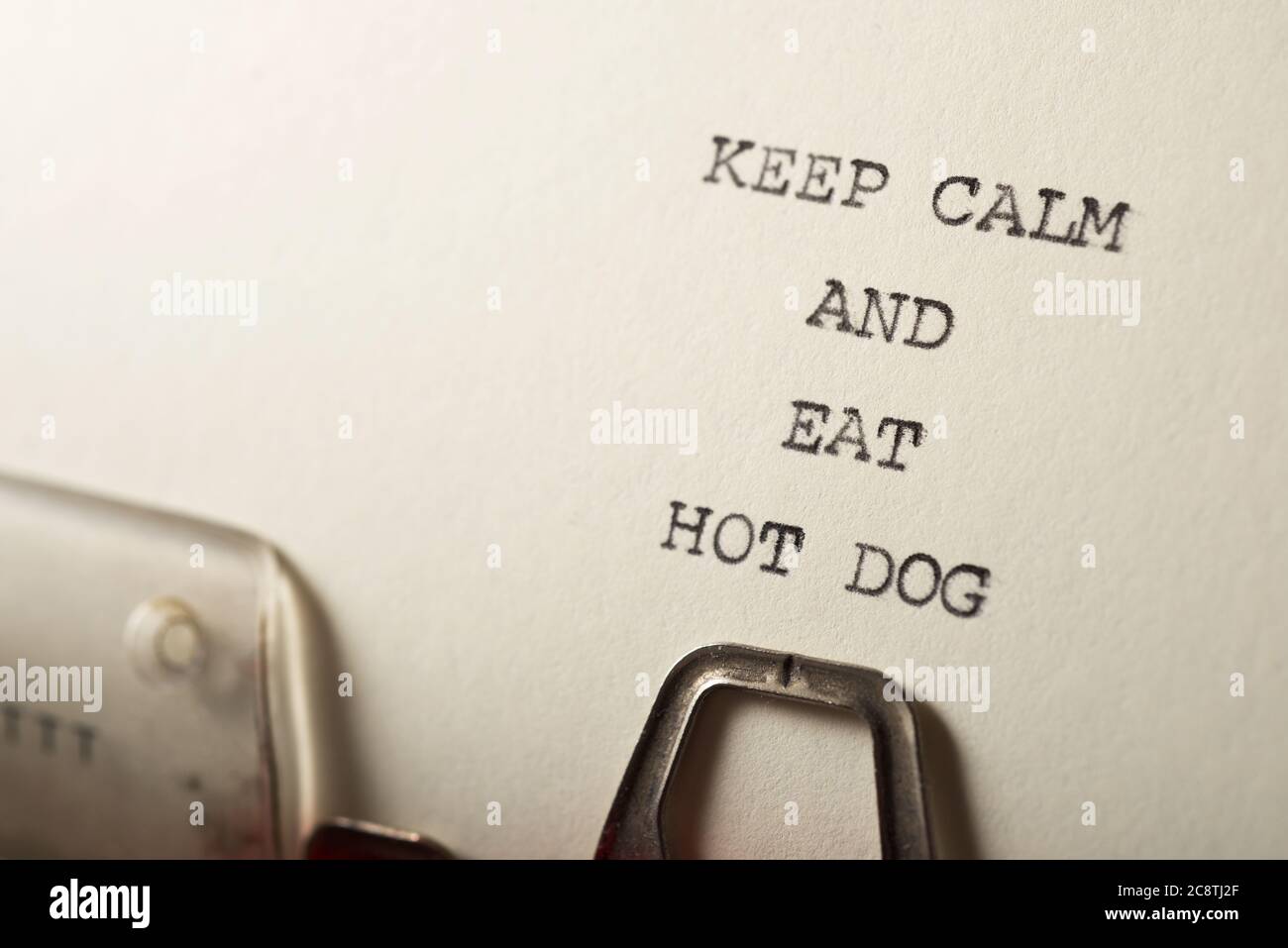Keep calm and eat hot dog text written with a typewriter Stock Photo ...