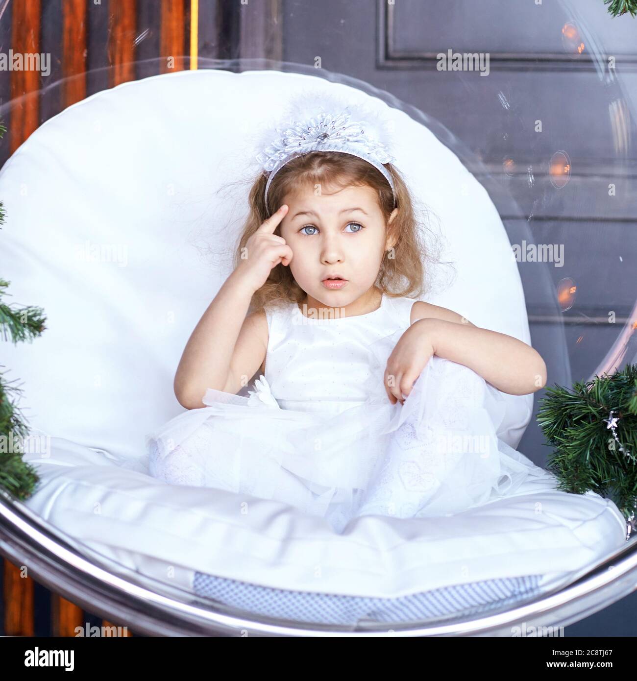 Happy amazed female kid emotion. Suprised and thinking child studio ...