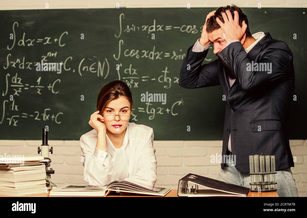Man unhappy communicating. School principal talking about punishment ...